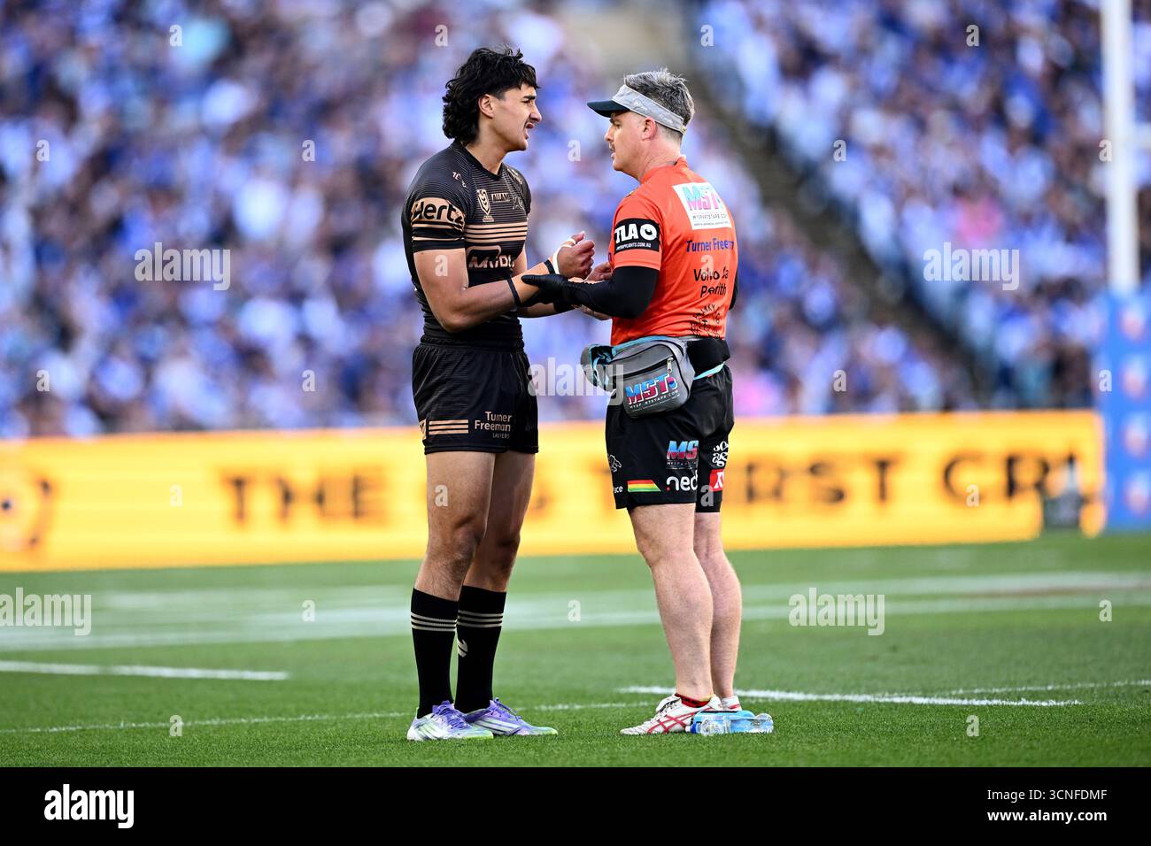 Casey McLean of the Panthers receives attention during the NRL Semi ...