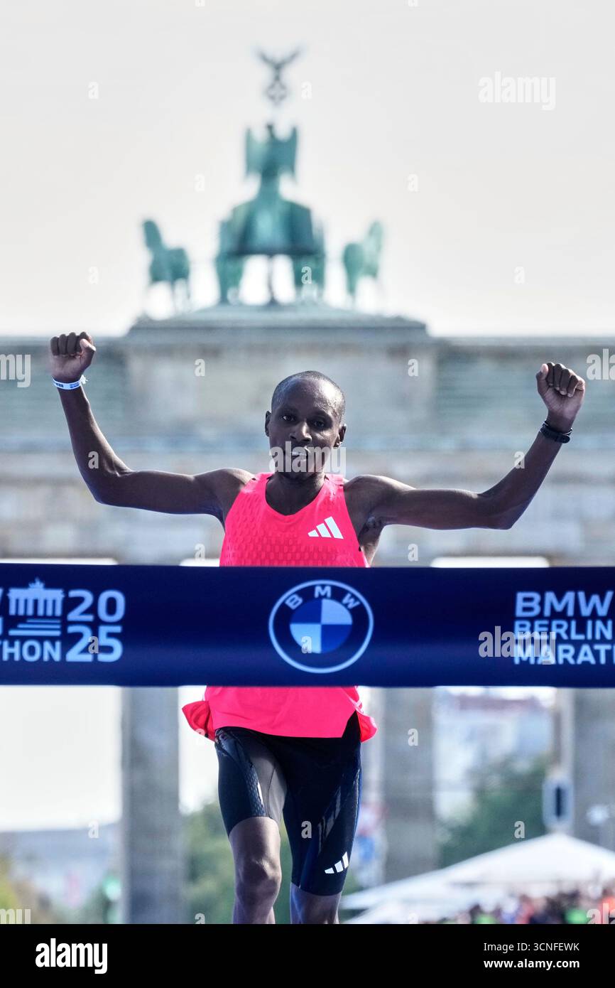 Kenya's Sebastian Sawe crosses the finish line to win the Berlin ...