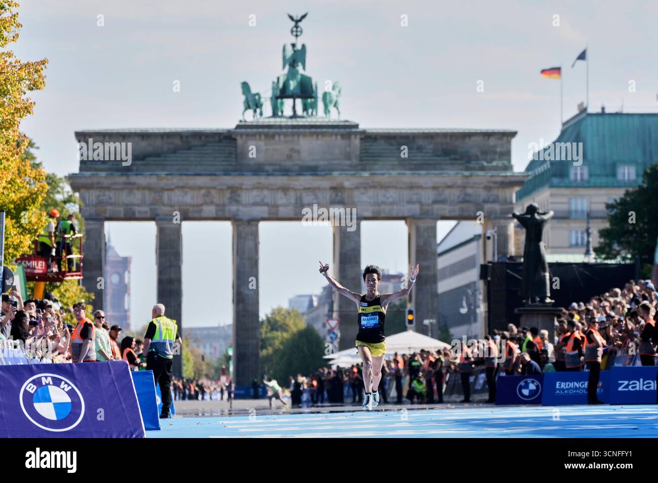 Japan's Akira Akasaki crosses the finish line to finish second in the ...