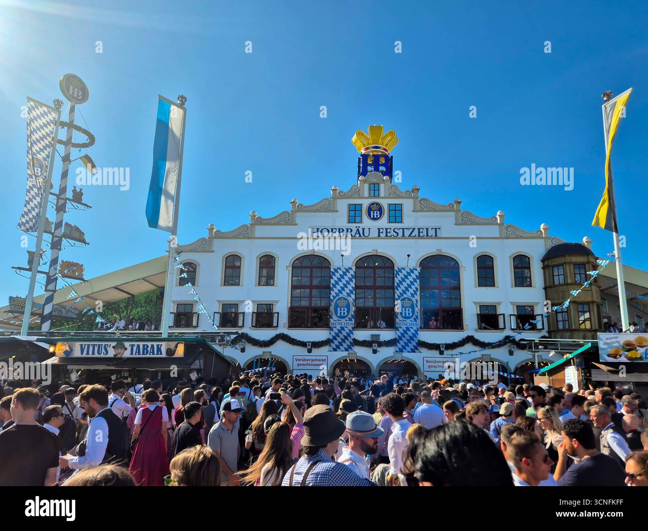 MUNICH, GERMANY - SEPTEMBER 20, 2025: Hofbraeuhaus tent with crowd of ...