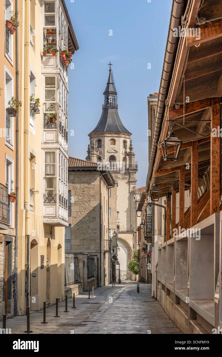 Historic Medieval Church Tower Through Narrow Stone Street in Vitoria ...
