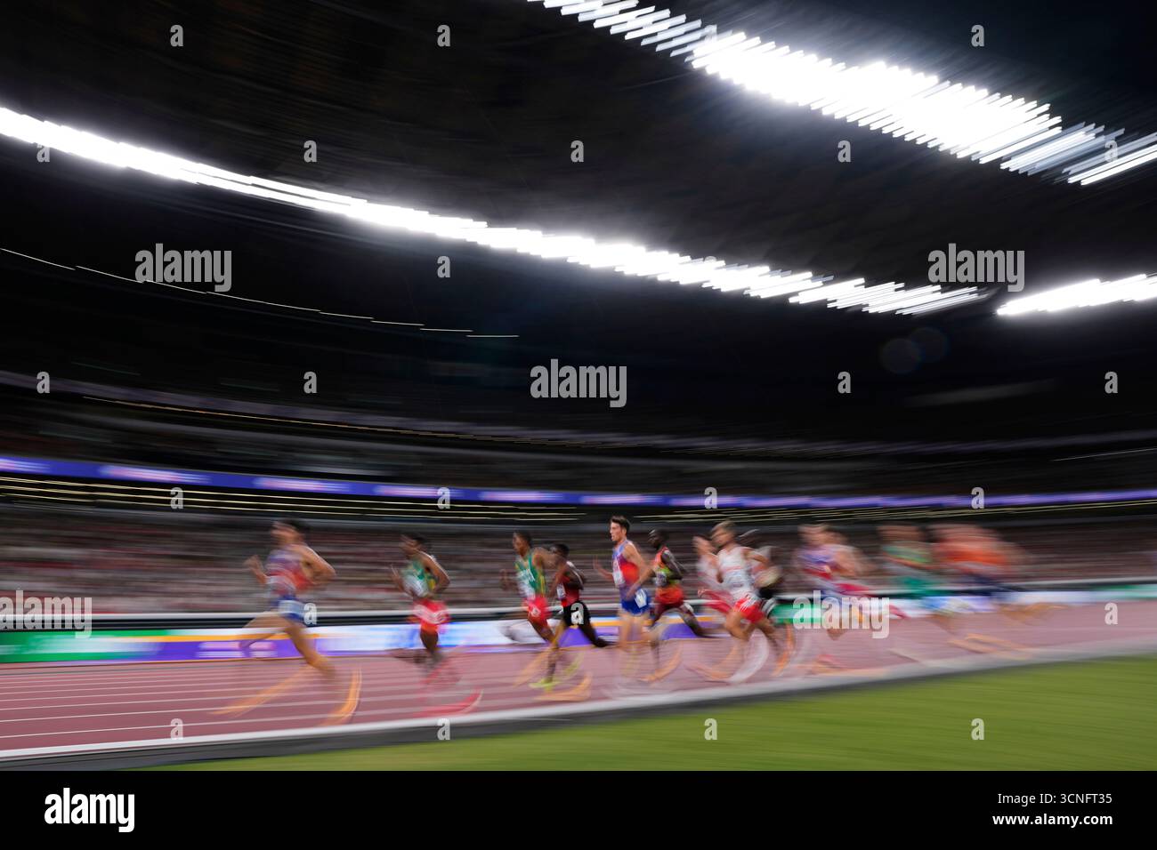Runners compete in the men's 5,000 meters final at the World Athletics ...