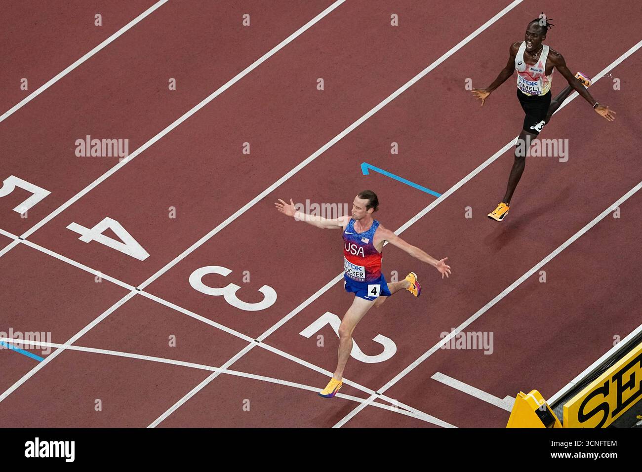 United States' Cole Hocker wins the men's 5,000 meters final followed ...