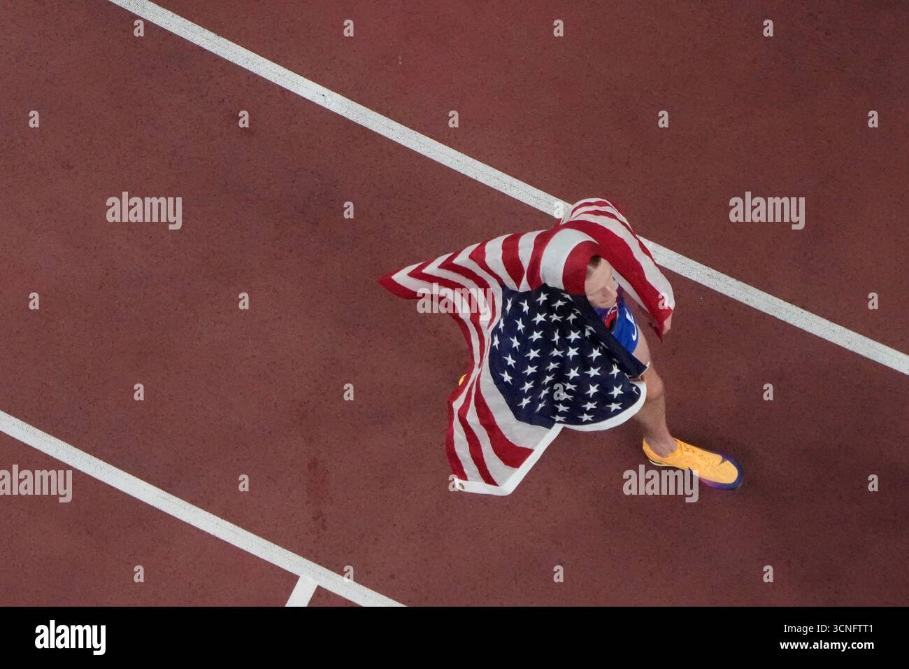 United States' Cole Hocker celebrates after winning the men's 5,000 ...