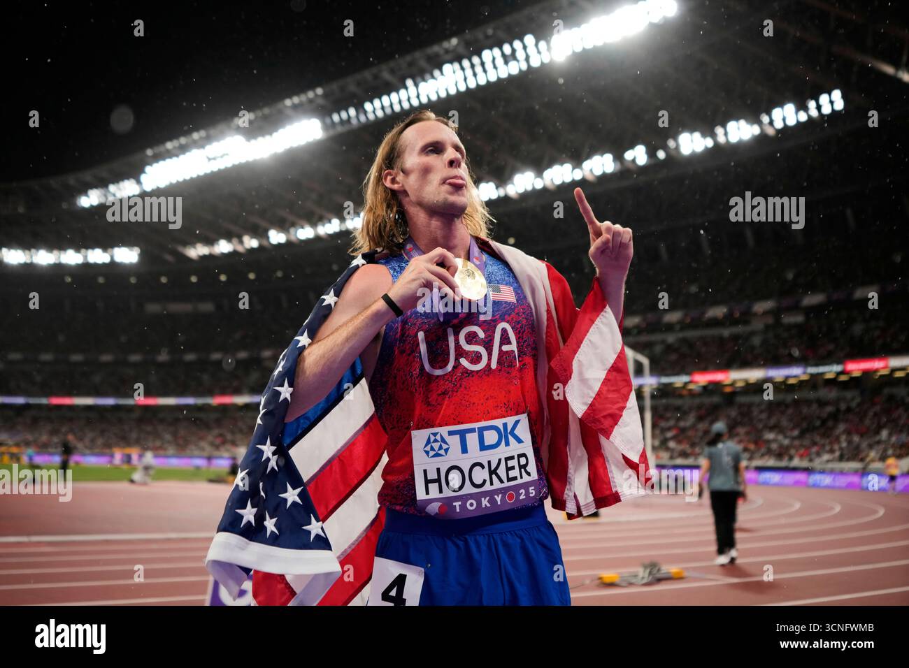 United States' Cole Hocker celebrates his gold medal after the men's ...