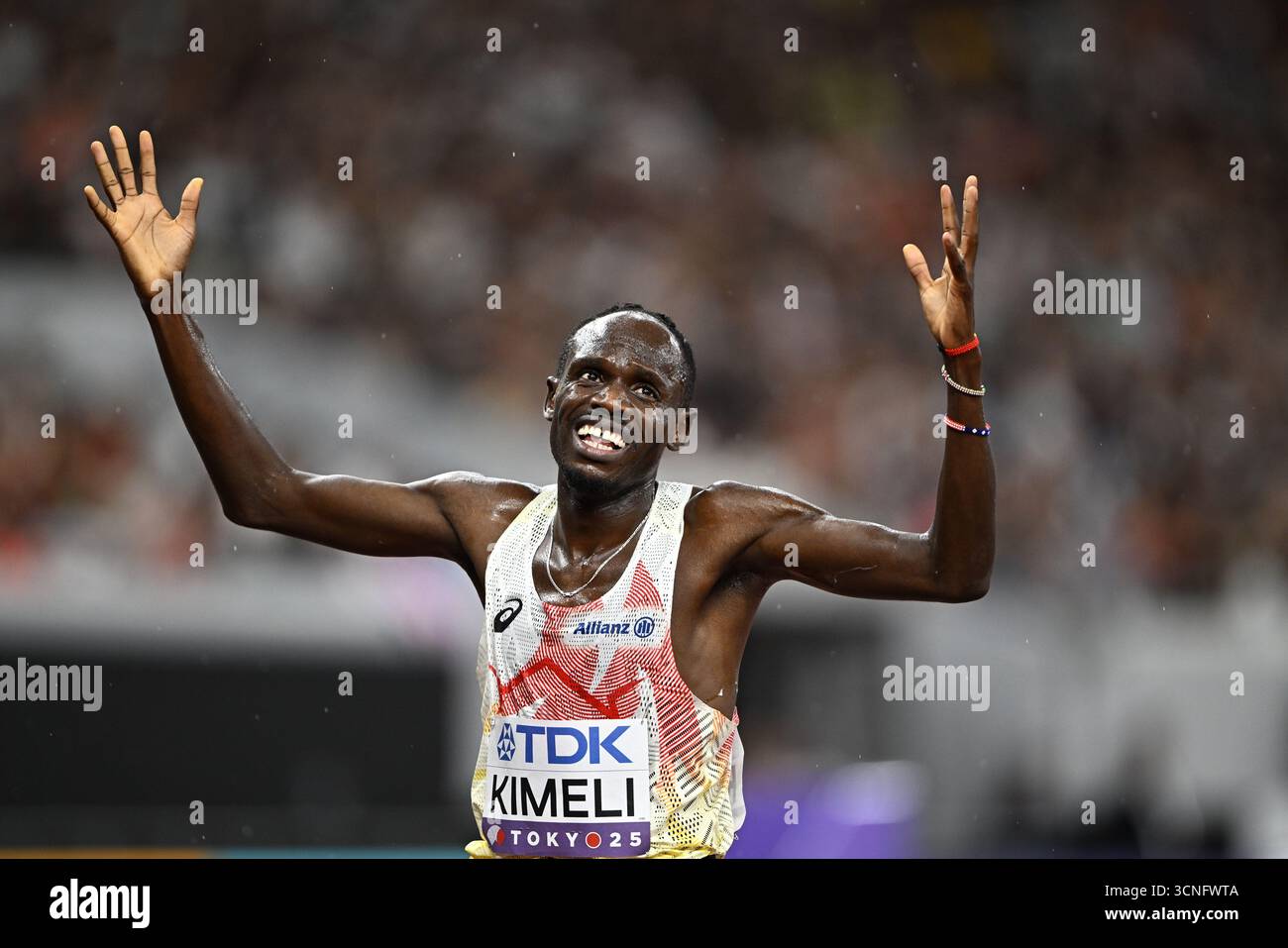 Belgian Isaac Kimeli celebrates after winning the silver medal in the ...