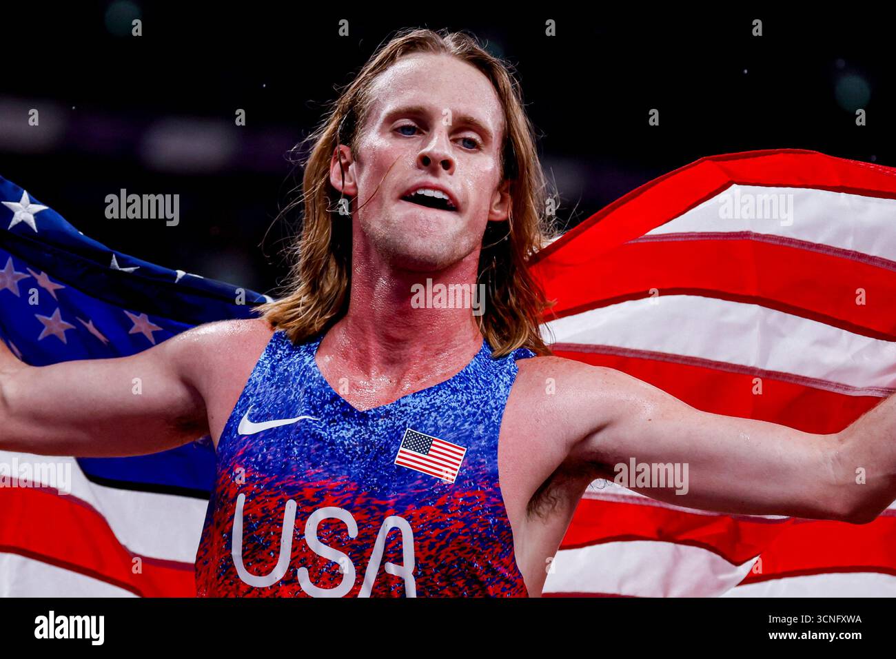 winner Cole Hocker of United States of America celebrating and holding ...