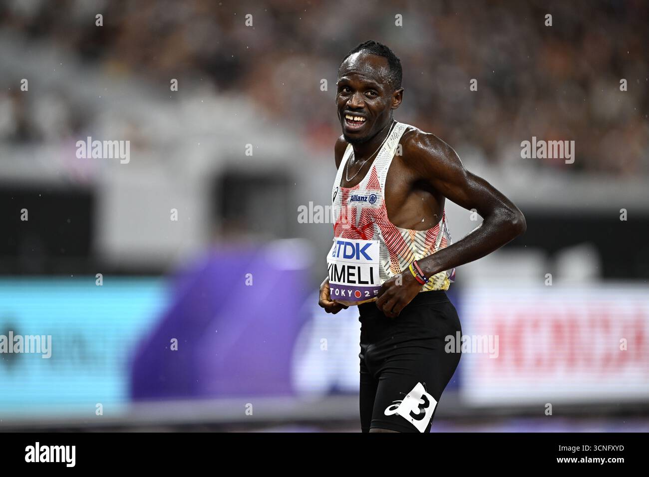 Belgian Isaac Kimeli celebrates after winning the silver medal in the ...