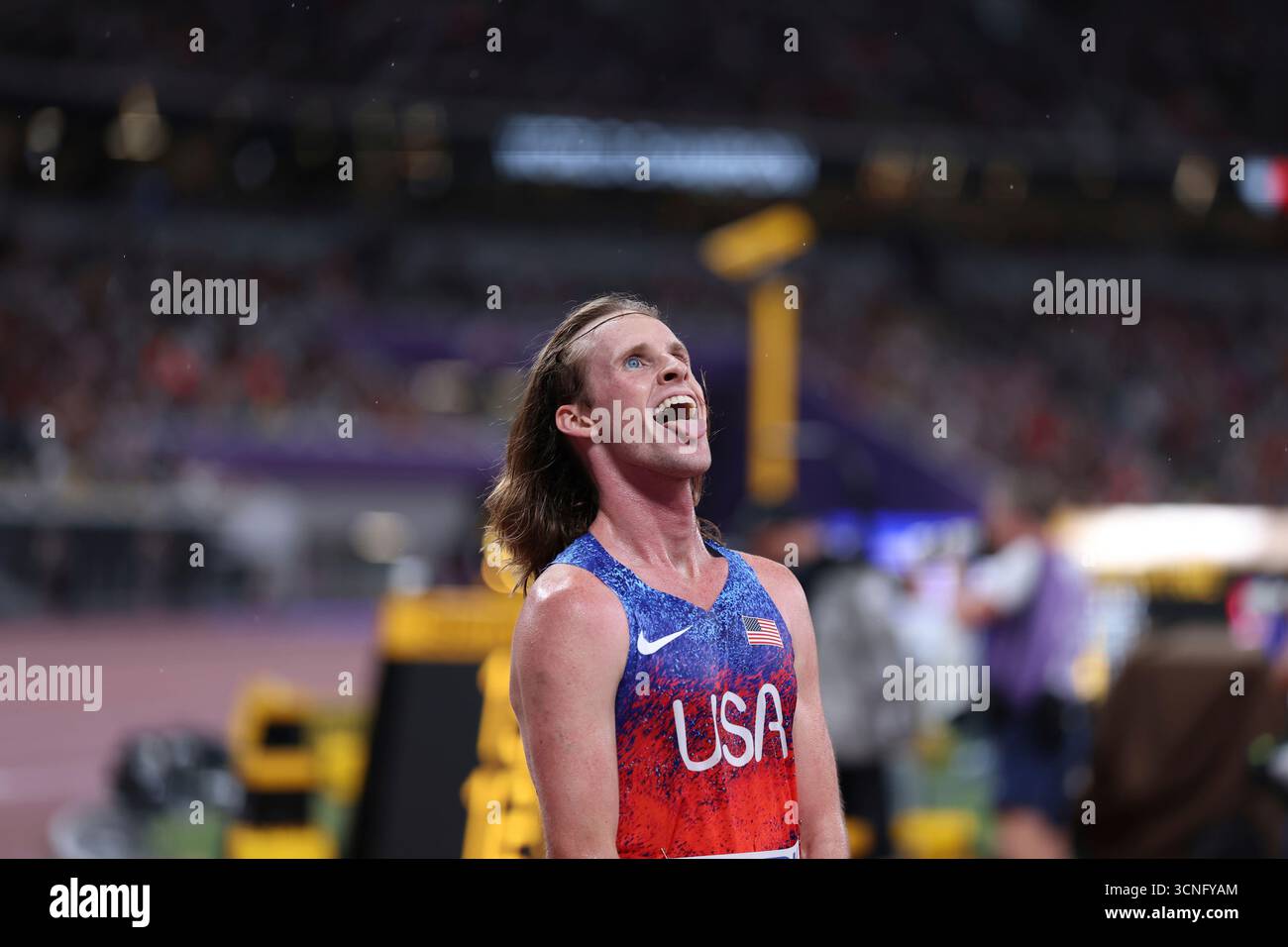 US's Cole HOCKER reacts after winning Men's 5000 Metres final in the ...