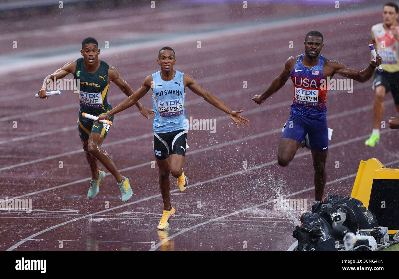 Busang Collen KEBINATSHIPI (C) and athletes of Botswana celebrate ...