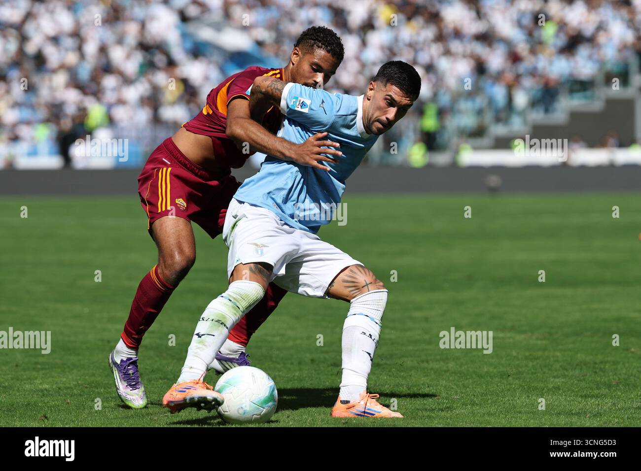 Lazio’s Mattia Zaccagni, Roma’s Devyne Rensch during the Serie A soccer ...