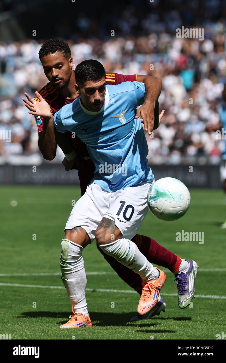 Lazio’s Mattia Zaccagni, Roma’s Devyne Rensch during the Serie A soccer ...