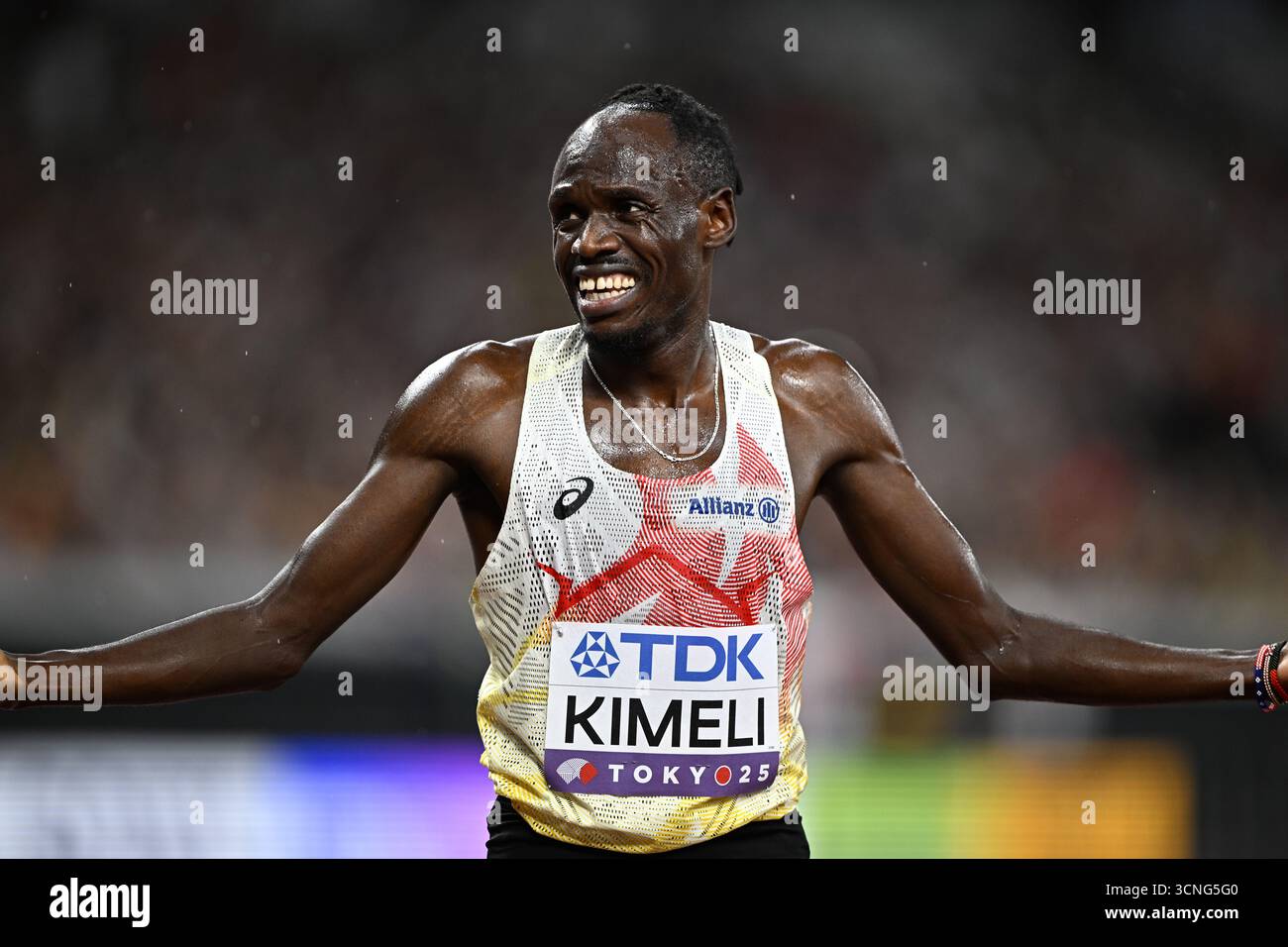 Belgian Isaac Kimeli celebrates after winning the silver medal in the ...