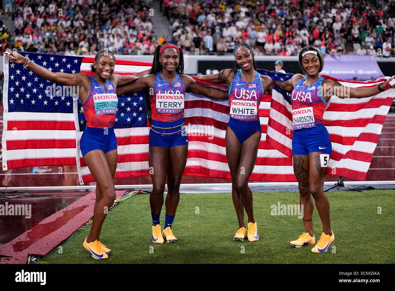 Team United States pose after winning the gold medal in the women's 4 X ...