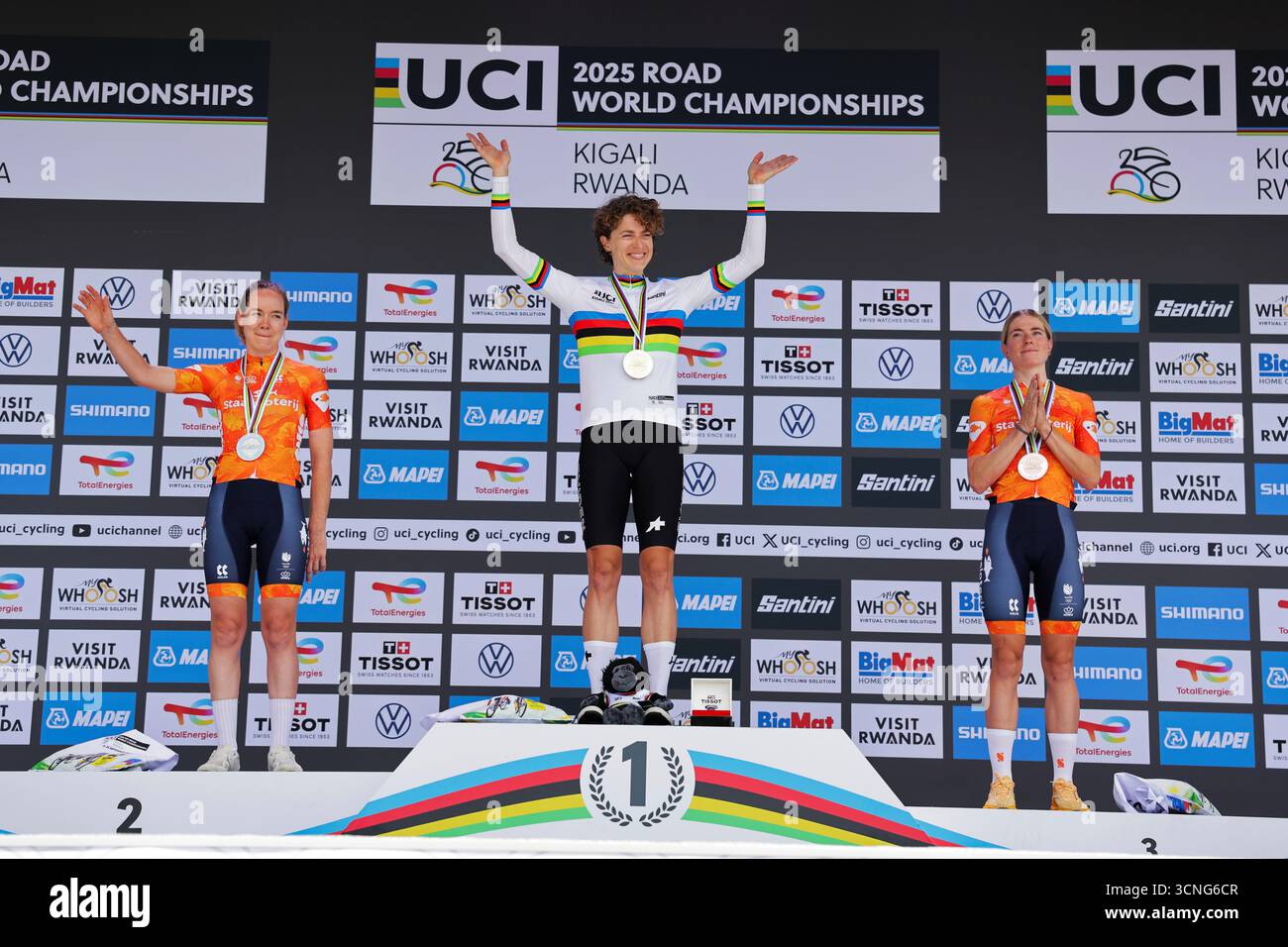 Switzerland's Marlen Reusser, center, winner of the women's elite ...