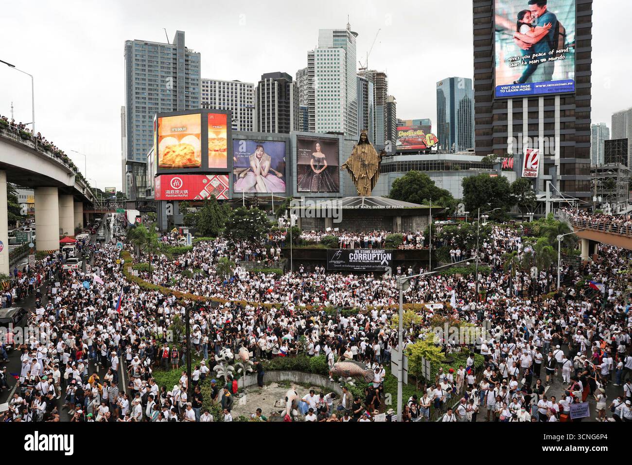 Thousands of protesters gather at the EDSA People Power Monument to ...