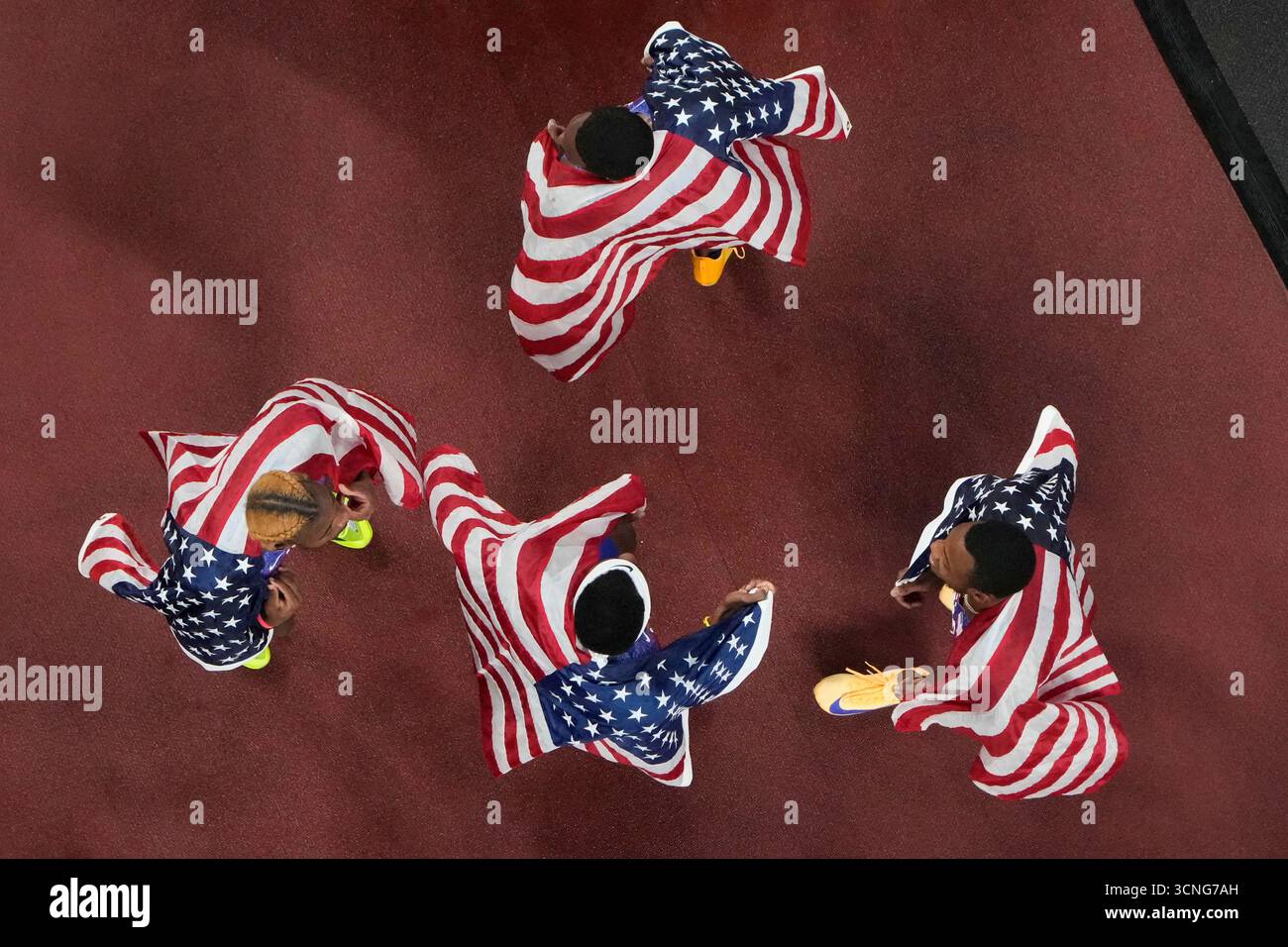 The United State's men's 4 X 100 meters relay team celebrate after ...