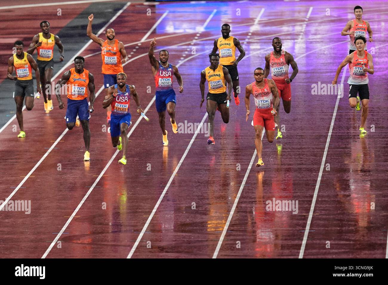 Athletes compete in the men's 4 X 100 meters relay final at the World ...