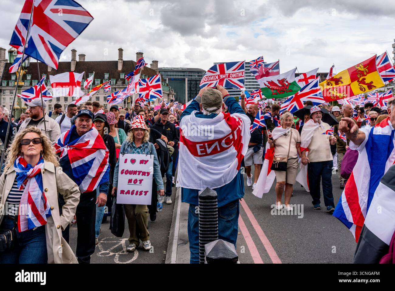 People March Over Westminster Bridge Waving Cross of St George and ...