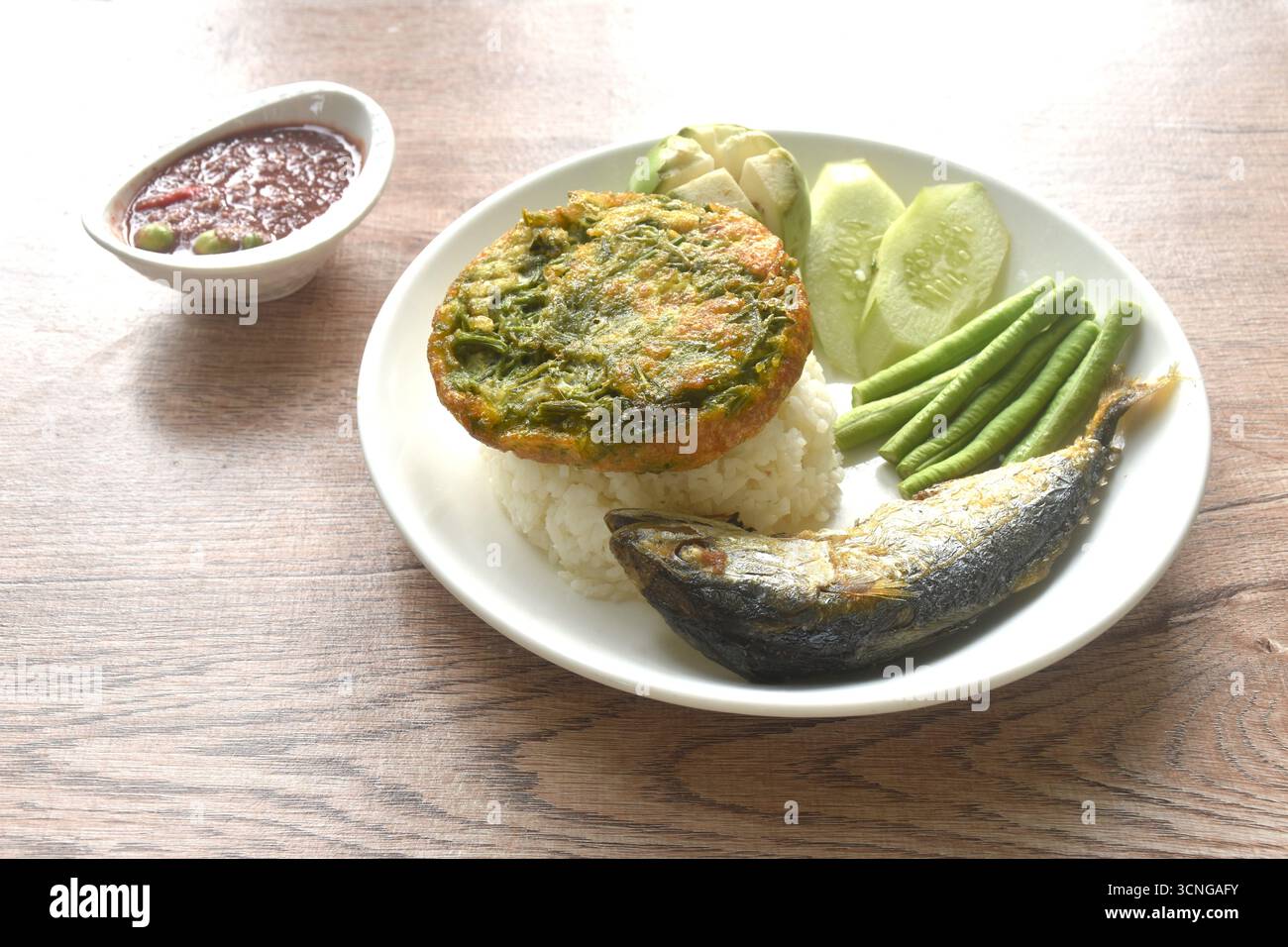 batter fried egg stuffed acacia and mackerel with fresh vegetable on ...