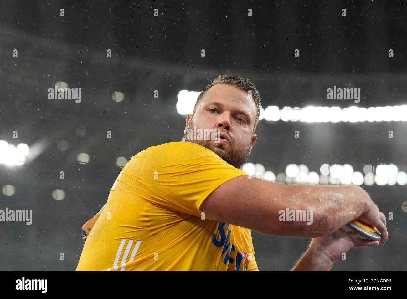 Sweden's Daniel Stahl makes an attempt in the men's discus throw final ...