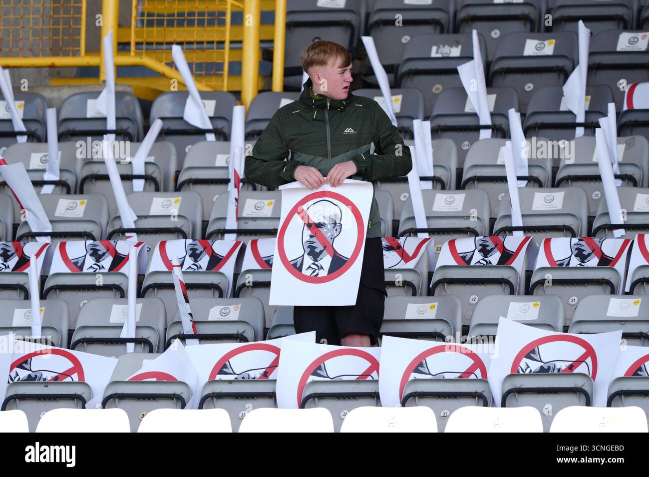 Celtic fans hold banners in protest of Celtic board member Michael ...