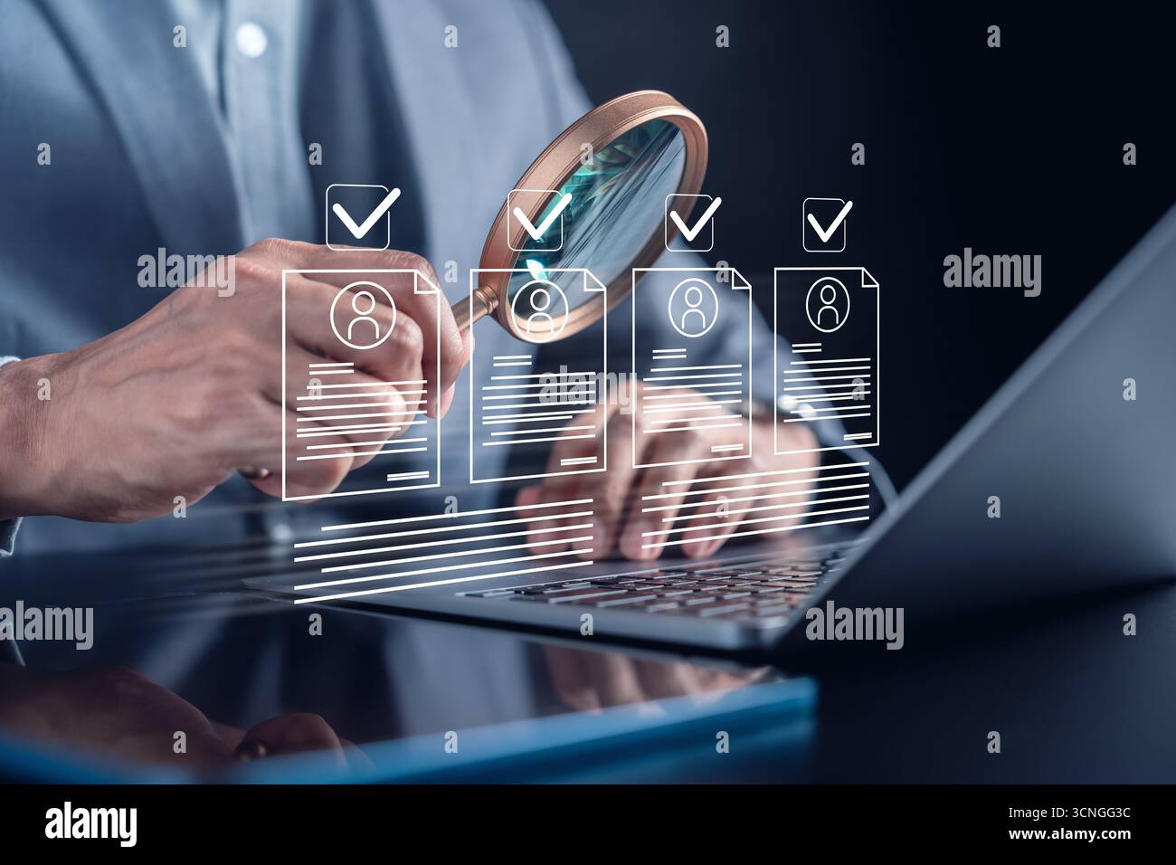 Candidate selection and recruitment reviewing resumes on laptop. hiring ...