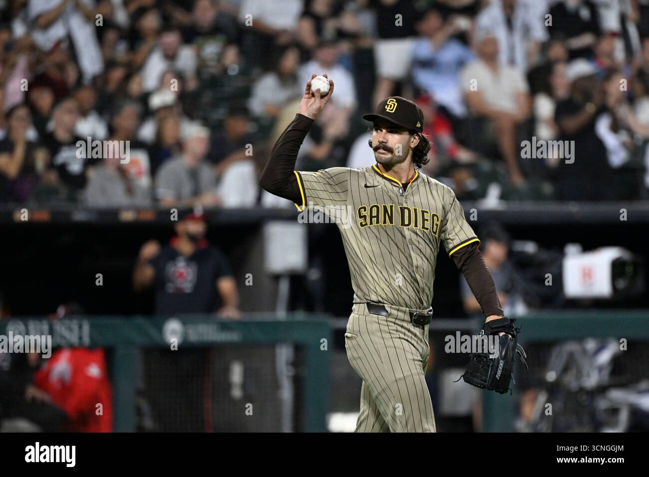 San Diego Padres pitcher Dylan Cease throws away a ball against the ...