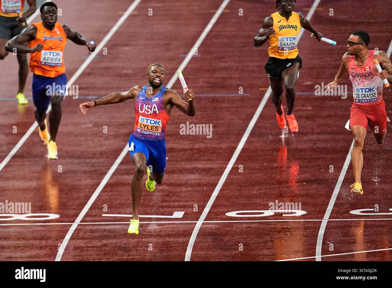 United States' Noah Lyles reacts as he crosses the finish line in the ...