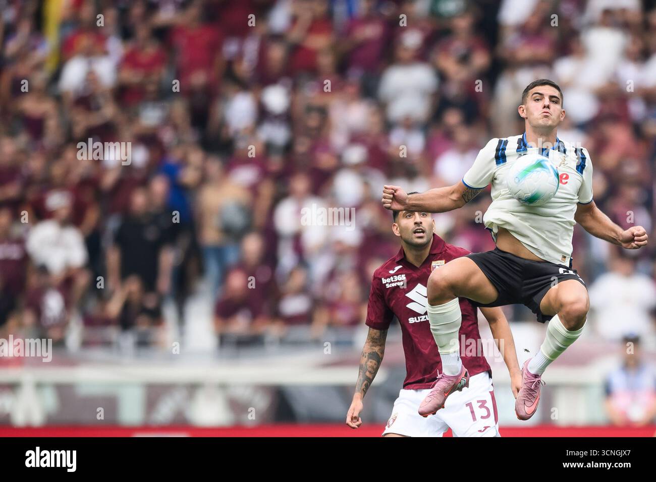 Nikola Krstovic of Atalanta BC competes for the ball with Guillermo ...