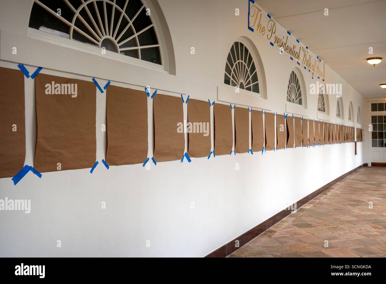 A sign reading "The Presidential Walk of Fame" and pieces of brown ...