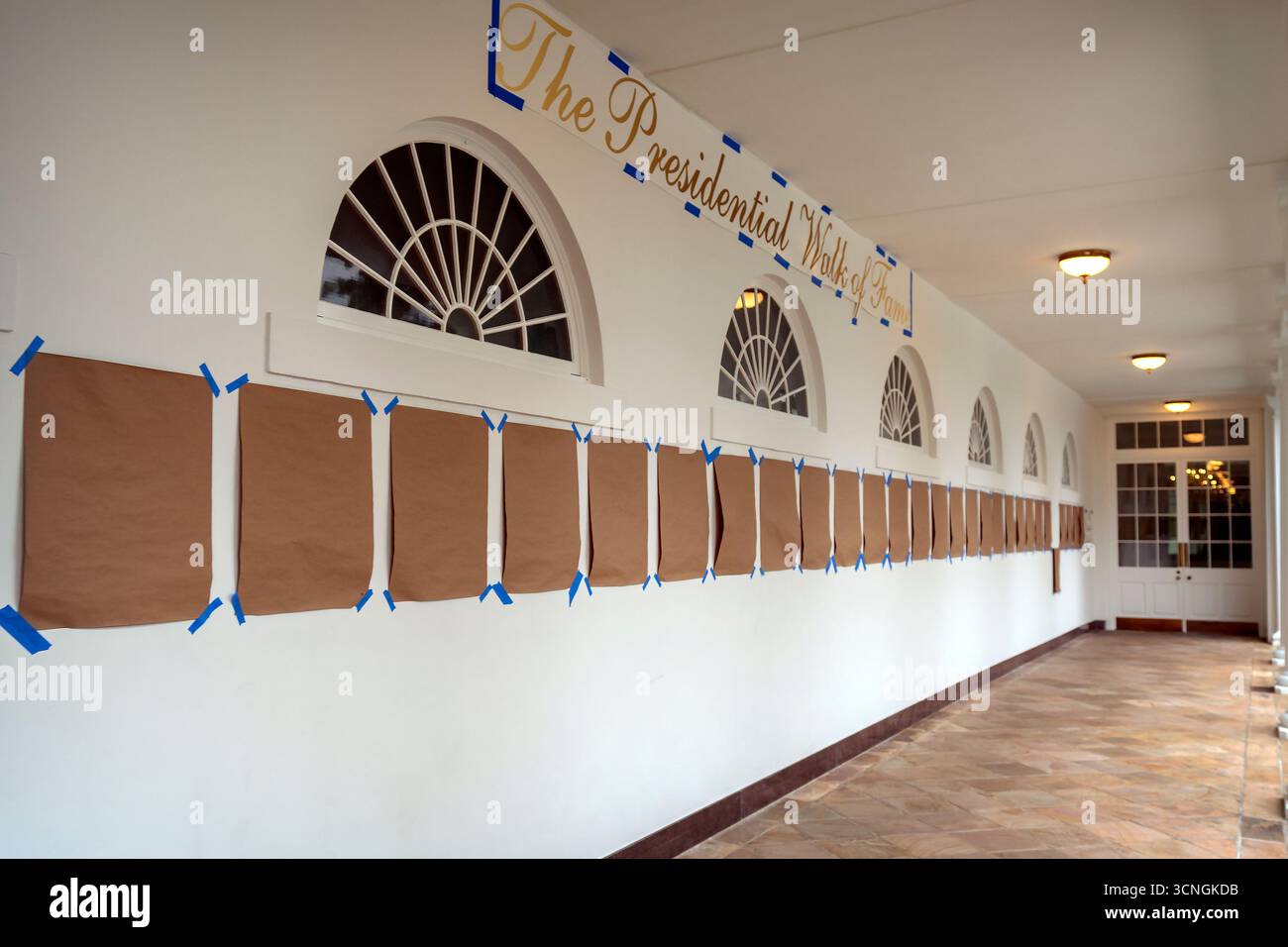 A sign reading "The Presidential Walk of Fame" and pieces of brown ...