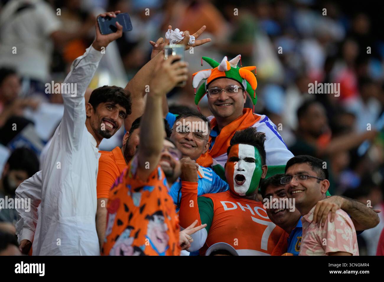 Indian supporters cheer for their team ahead of the Asia Cup cricket ...