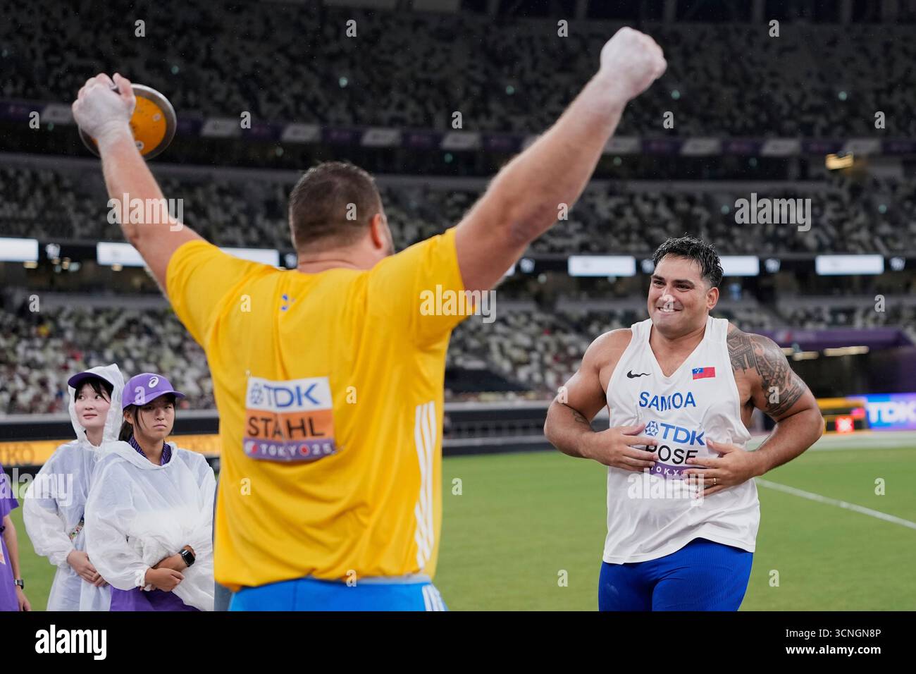 Samoa's Alex Rose, right, is congratulated by Sweden's Daniel Stahl ...
