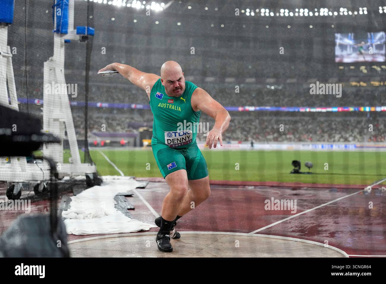 Australia's Matthew Denny makes an attempt under falling rain during ...