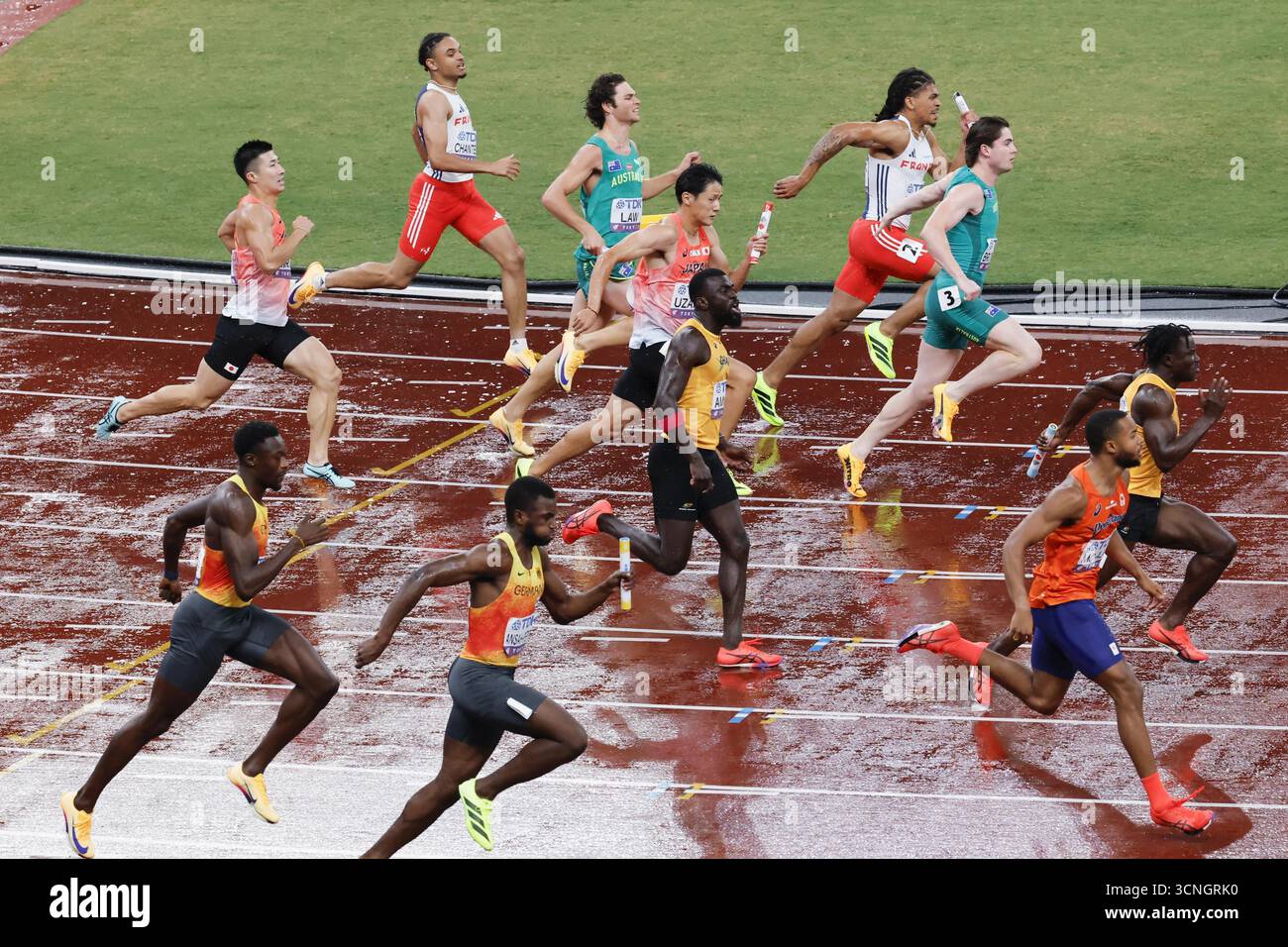 Athletes compete in the men's 4x100-meter relay final at the World ...