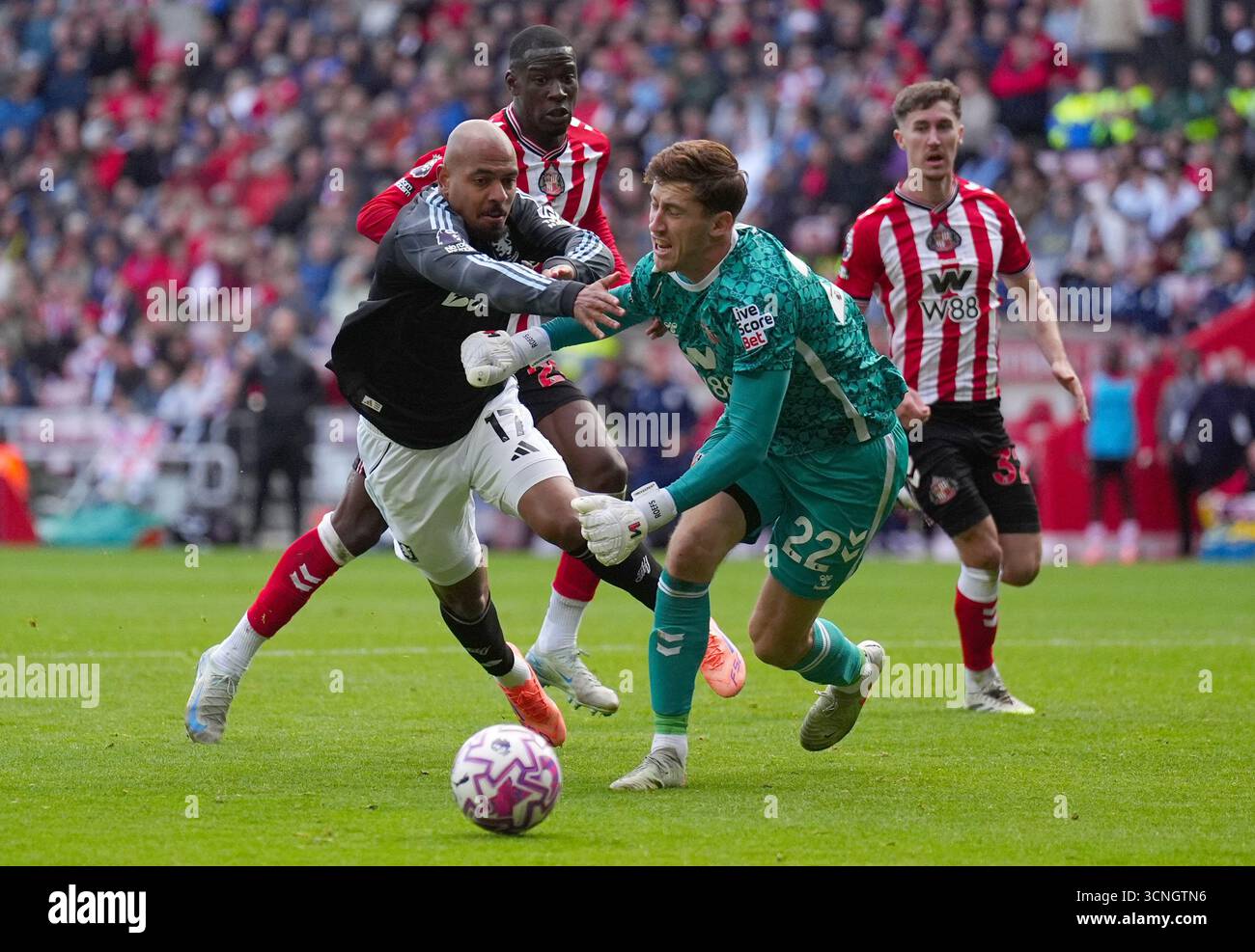 Aston Villa's Donyell Malen and Sunderland goalkeeper Robin Roefs ...