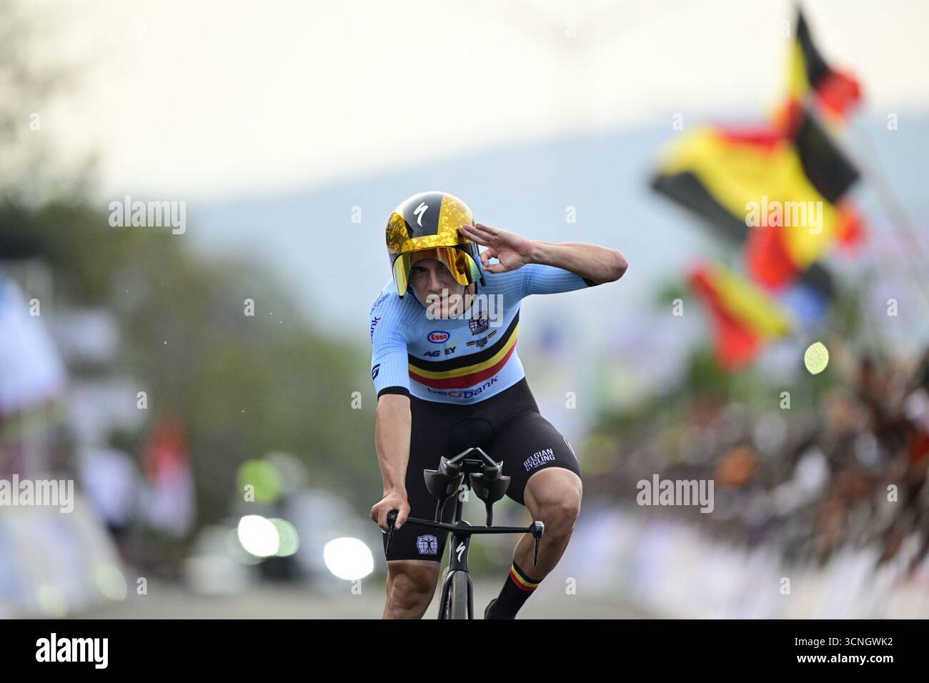 Belgian Remco Evenepoel crosses the finish line to win the Men Elite ...