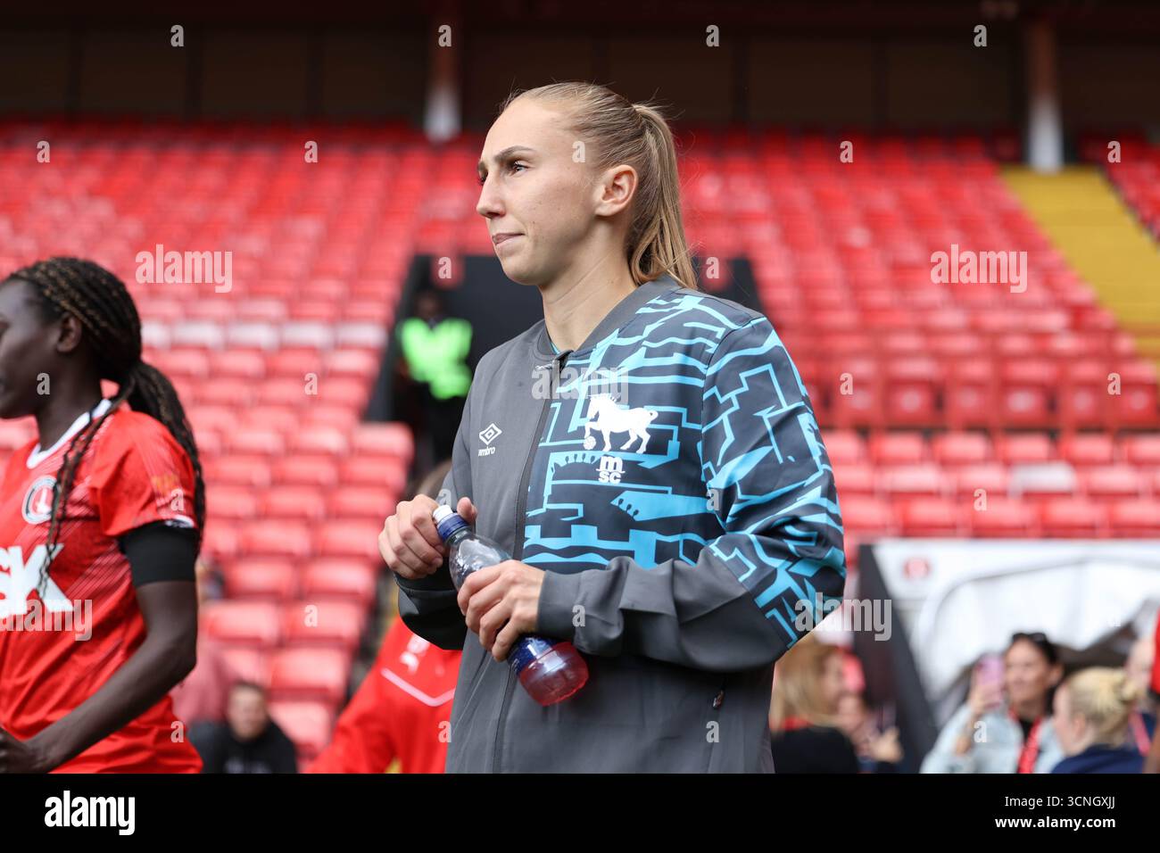 Grace Neville, of Ipswich Town Women, walking into the pitch for the ...