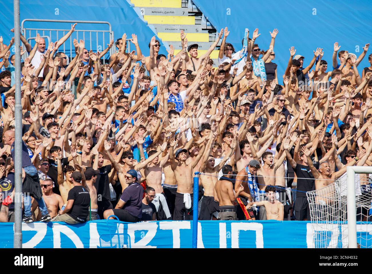 Novara, Italy. September 2025. Fans of Novara Calcio cheer during the ...