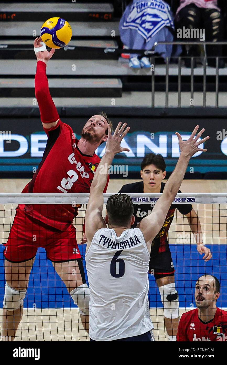 Sam Deroo, left, of Belgium, in action against Petteri Tyynismaa, right ...