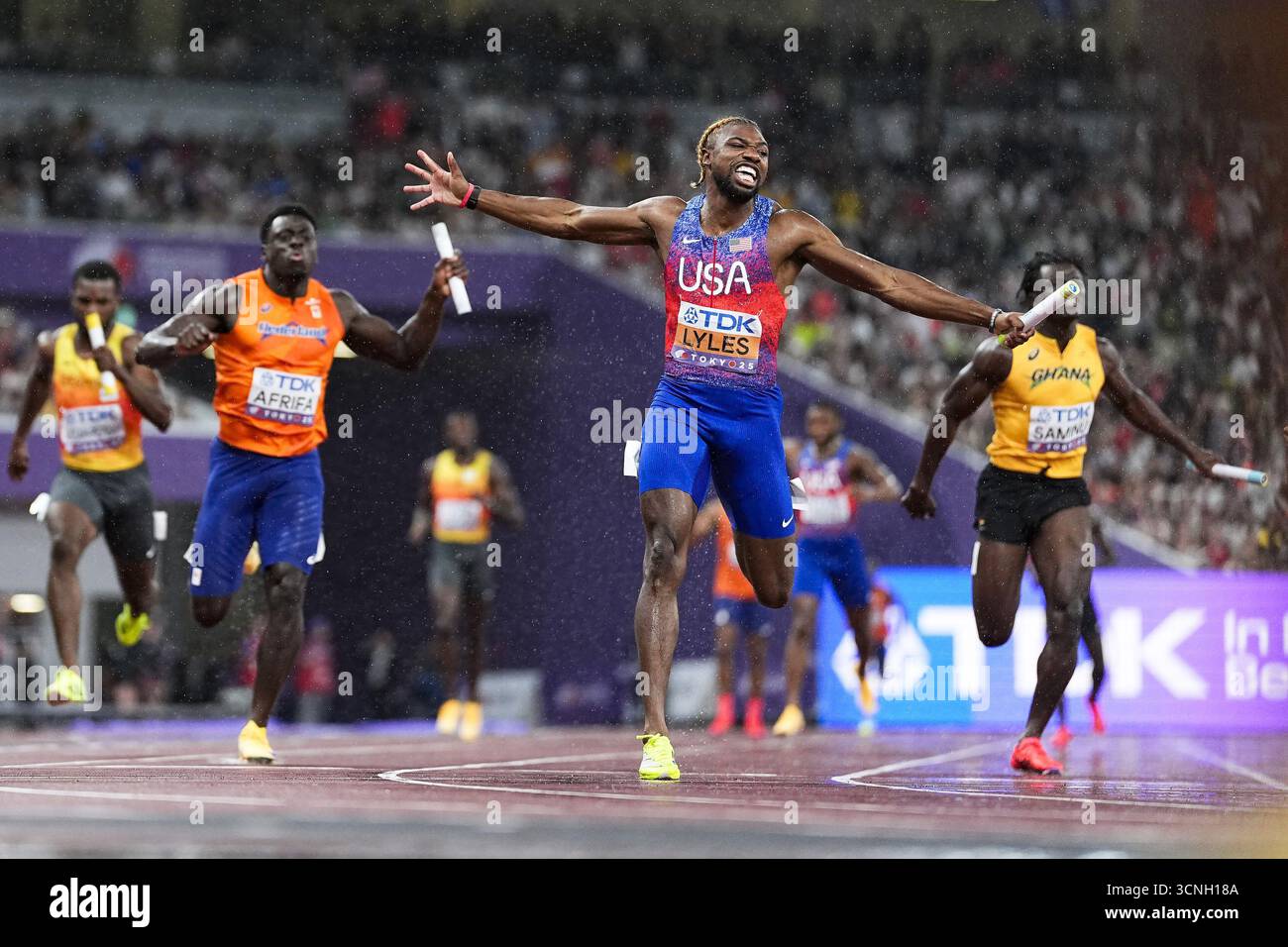 Noah Lyles of the United States celebrates as he crosses the finish ...