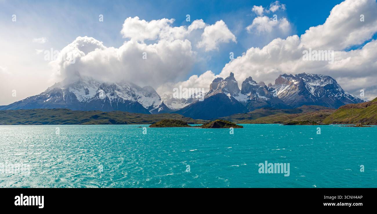 Mountain peaks panorama of Cuernos and Torres del Paine by Pehoe Lake ...