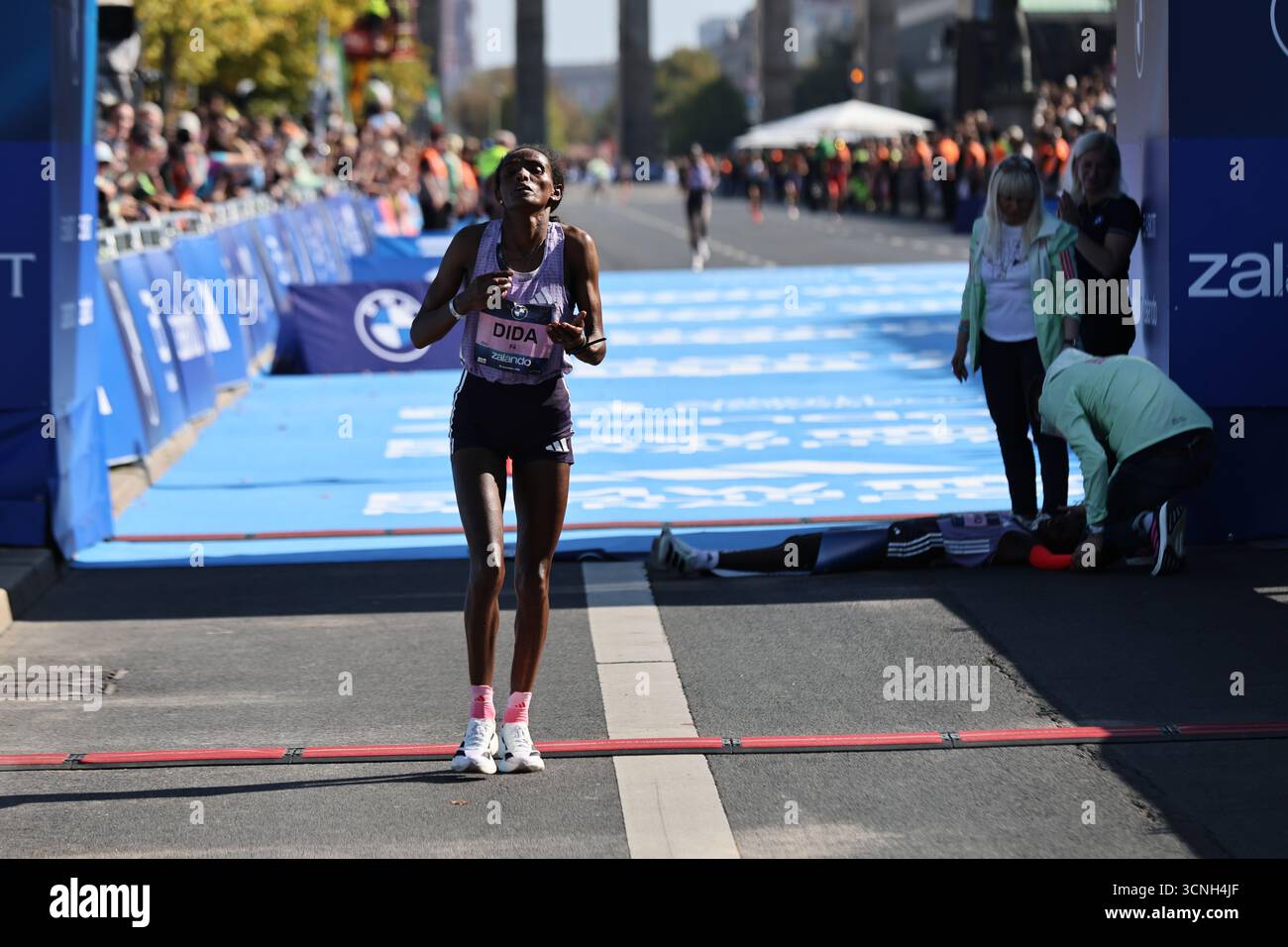 09/21/2025, Berlin, Germany. Dera Dida at the finish. Rosemary Wanjiru ...