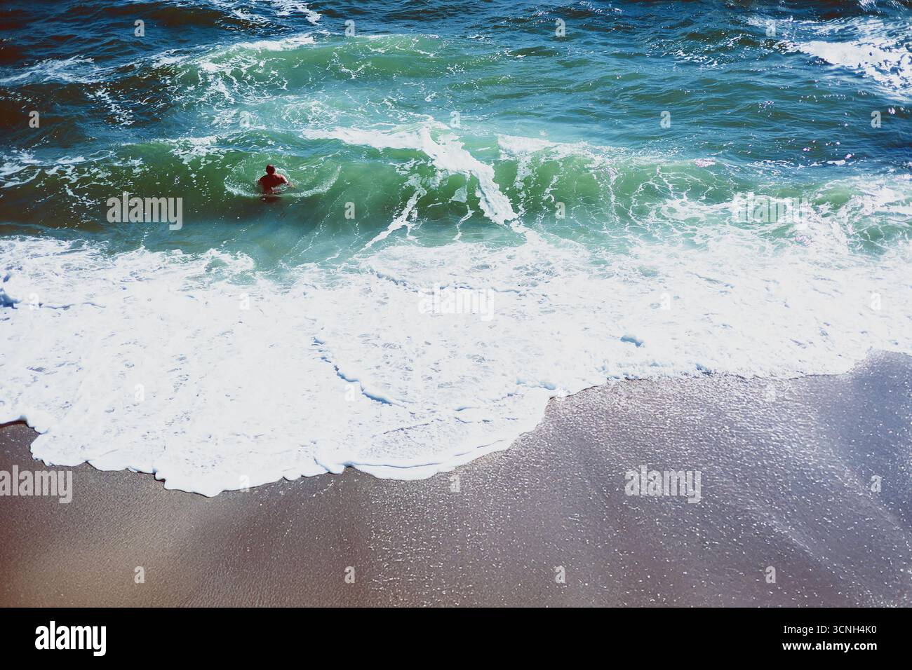 Male ocean swimmer hi-res stock photography and images - Alamy