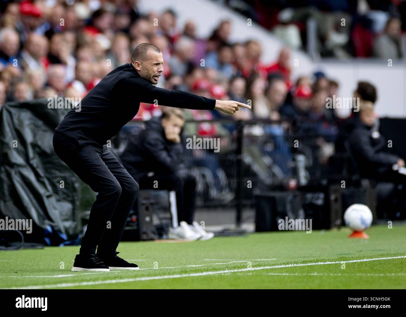 EINDHOVEN - Ajax coach Johnny Heitinga during the Dutch Eredivisie ...