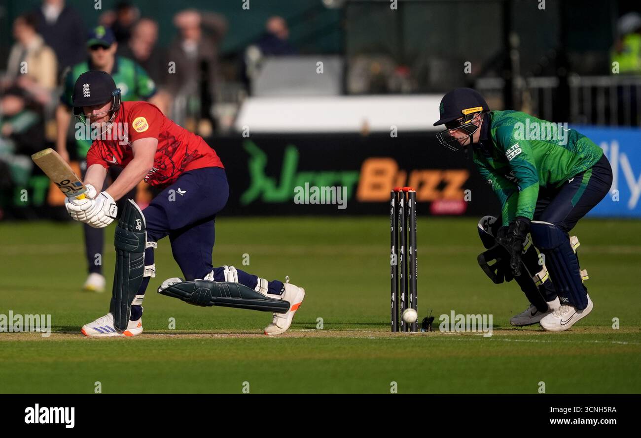 England's Jordan Cox (left) batting while Ireland wicket keeper Lorcan ...