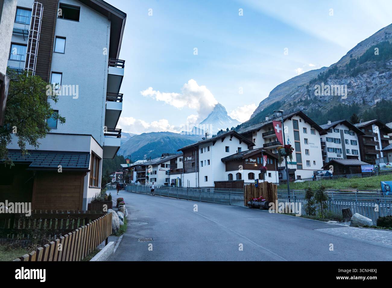 City of Zermatt with the Matterhorn in the background, evening lights ...