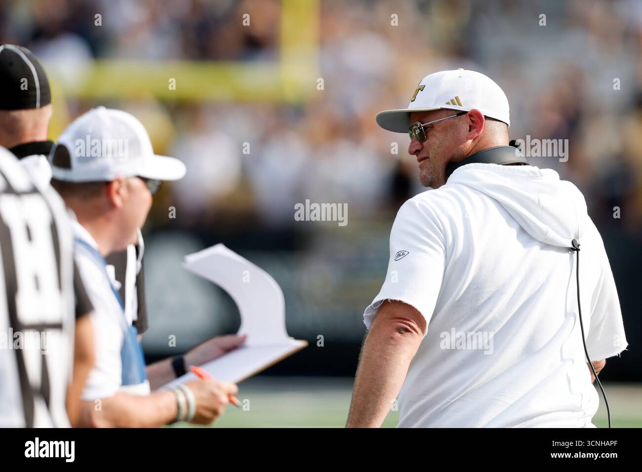 Georgia Tech head coach Brent Key walks the sideline during the first ...
