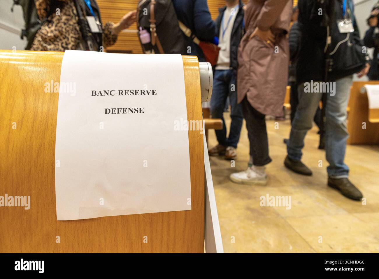 "Defense bench reserved" poster in the courtroom of the Criminal Court ...